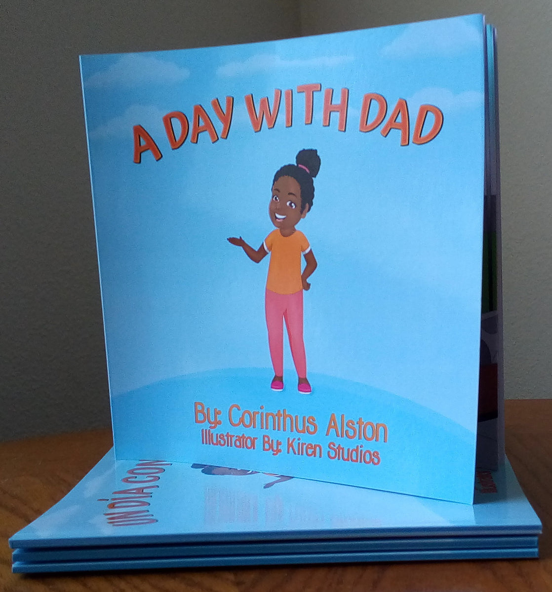 A Day With Dad / Un Día con Papá – Wonders of the World Book and Toy Store